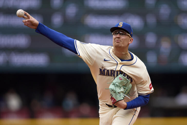 Cal Raleigh hits 10th homer, Logan Evans wins in debut as the Mariners ...